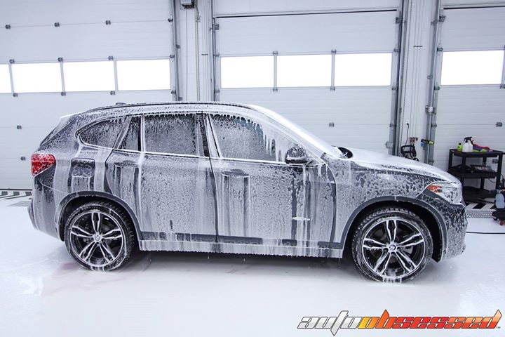 Starting the wash process – rinse and foam shampoo. 2016 BMW X1 in our ...